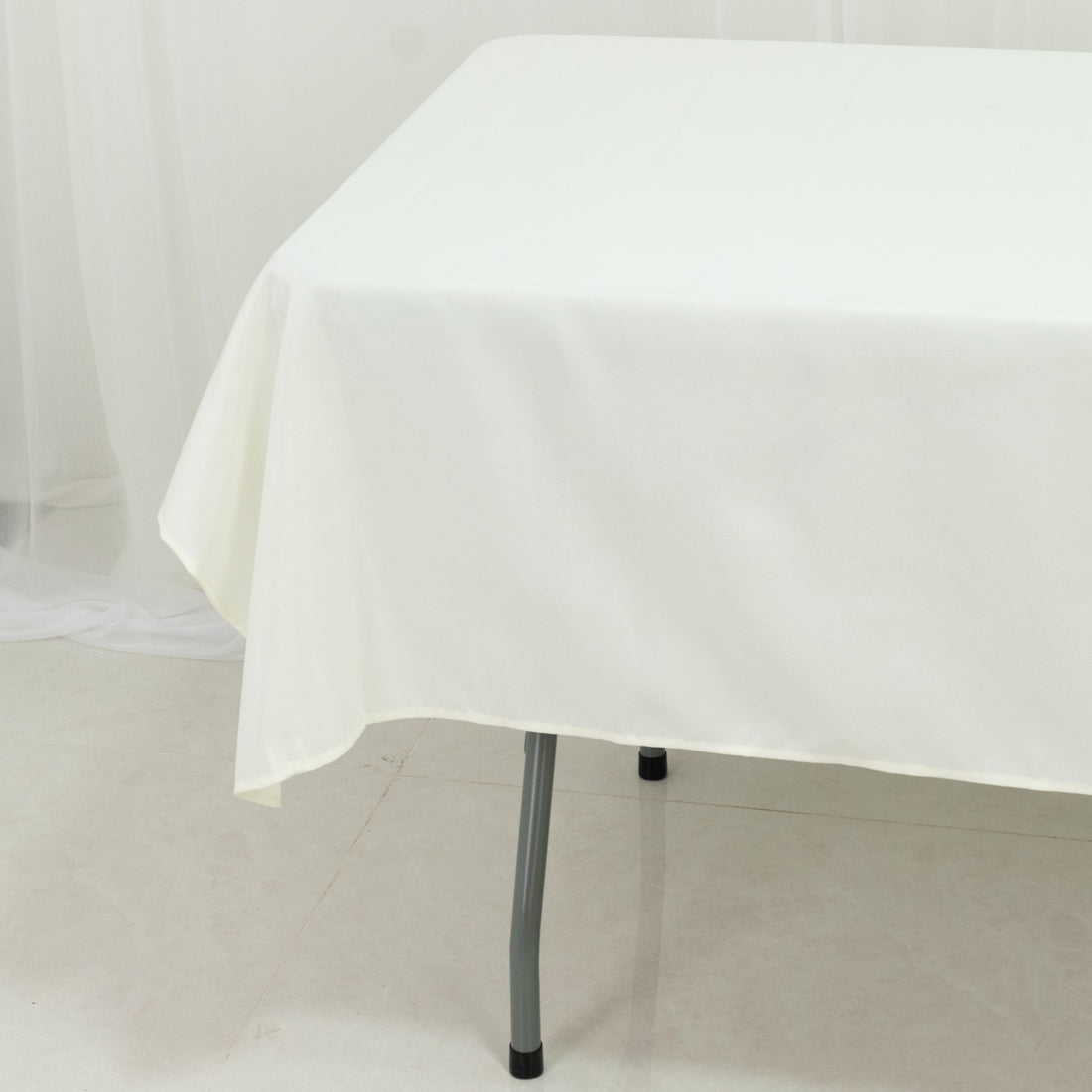 60×84" Polyester Rectangle Tablecloth Ivory | eFavormart