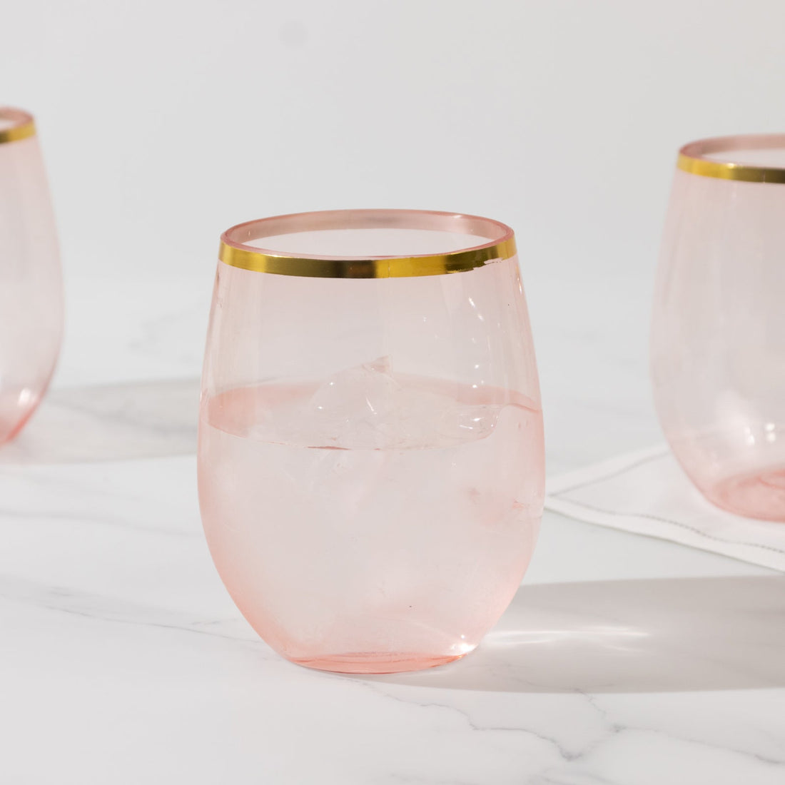 Transparent Blush Stemless Wine Glass with Gold Rim 12oz | eFavormart