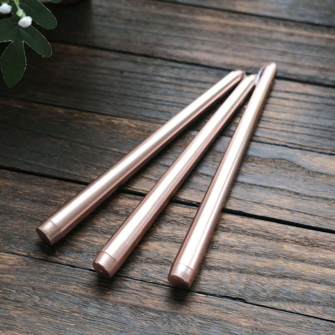Metallic Rose Gold Taper Candles 12 Pack | eFavormart